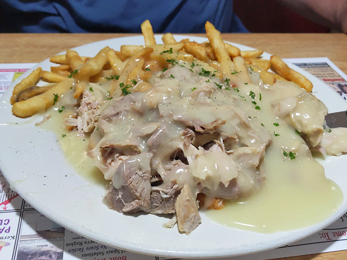 Hot turkey smothered in gravy that cascades over the meat like a savory waterfall. The fries aren't just a side&mdash;they're gravy delivery vehicles.