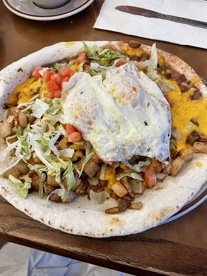 Breakfast of champions: eggs perched majestically atop a foundation of flavors that would make any morning worth getting up for.