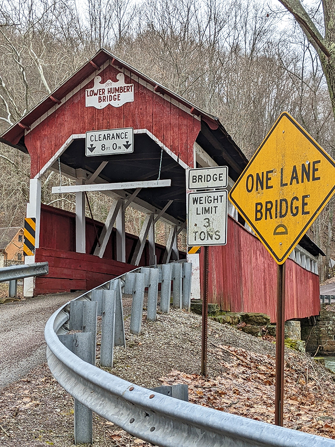 Warning signs and weight limits&mdash;the bridge's way of saying "I'm historic, not hydraulic." Respect your elders, especially the wooden ones.