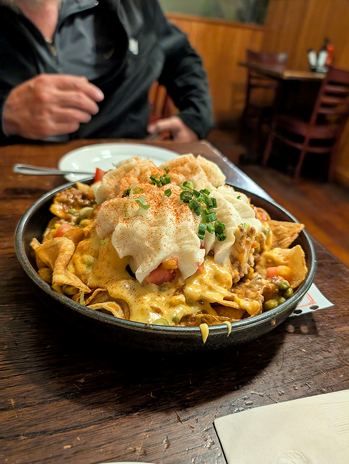 Irish nachos that laugh in the face of convention, where cheese, meat, and toppings unite in a glorious rebellion against dietary restraint.