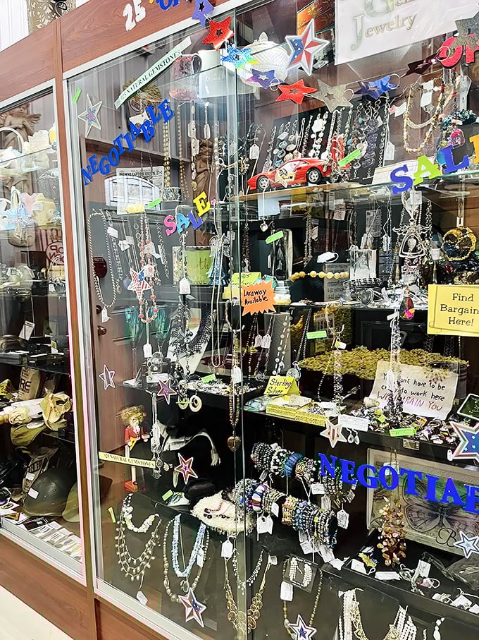 Jewelry hunters, prepare to negotiate! This sparkling case of vintage accessories promises that perfect conversation piece for your next dinner party. 