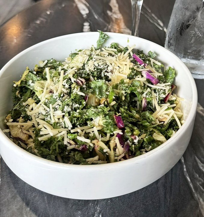 A kale salad that could convert even the most dedicated carnivore. Proof that vegetables can be both virtuous and delicious.