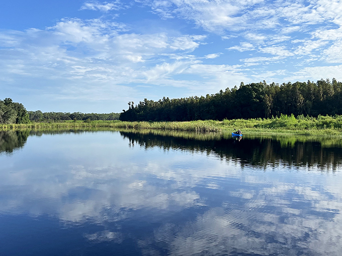 Mirror-like waters reflecting cloud masterpieces. This lake scene offers twice the view with half the effort &ndash; nature's version of a two-for-one special.