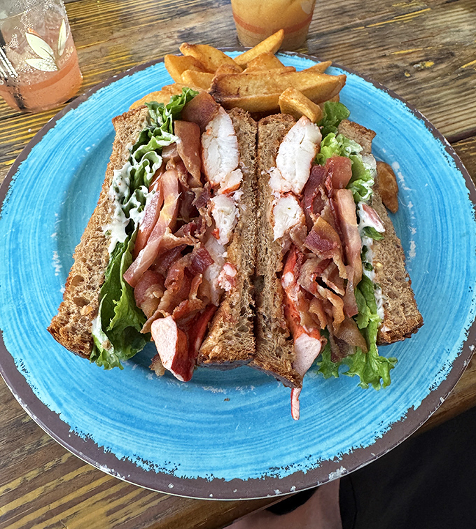 This isn't your average BLT&mdash;it's a seafood-enhanced masterpiece where lobster meat meets crispy bacon in a sandwich that demands to be photographed before eaten.
