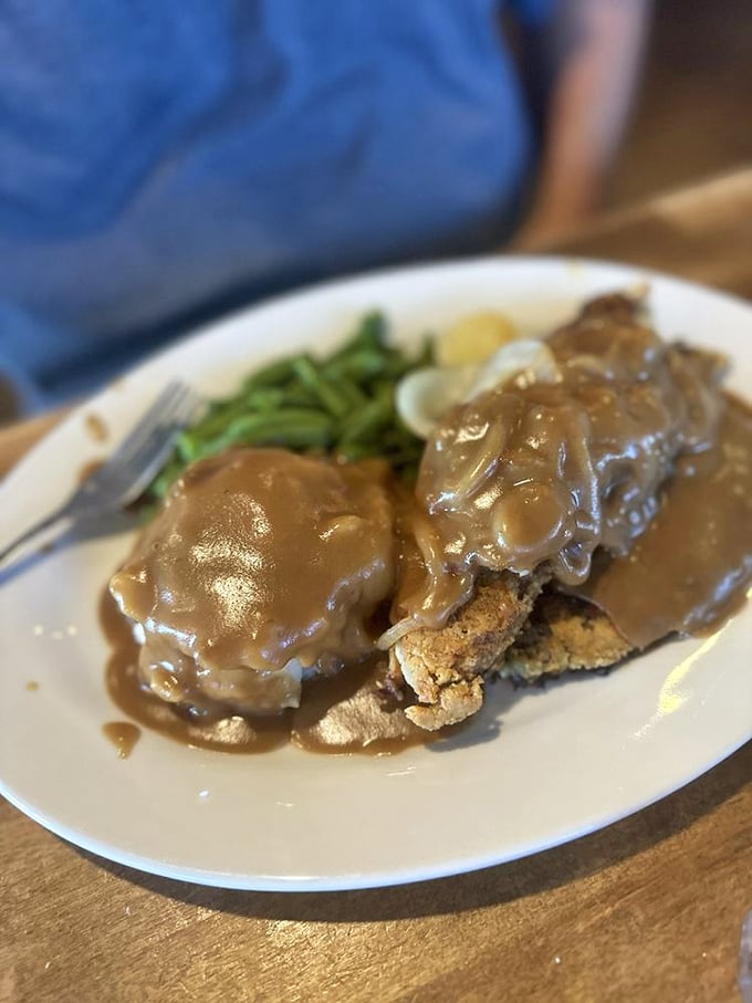 Comfort food that transports you straight to grandma's kitchen&mdash;tender meat swimming in gravy that could solve most of life's problems.