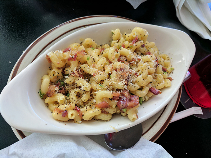 Mac and cheese that's had a serious upgrade from your childhood memories. The bacon adds a smoky depth that makes adulting worthwhile.