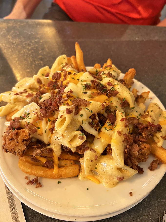 Comfort food engineering at its finest&mdash;pasta, cheese, fries and meat coming together in a dish that laughs in the face of diet culture.