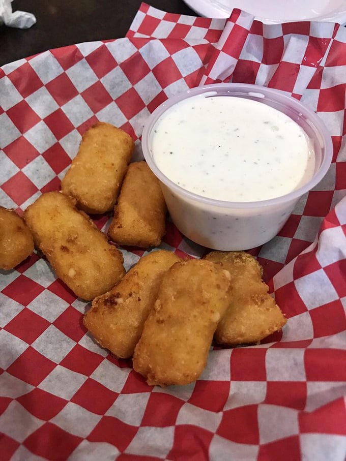 Mac and cheese bites: Childhood comfort food reimagined as a perfect finger food. Nostalgia never tasted so good.