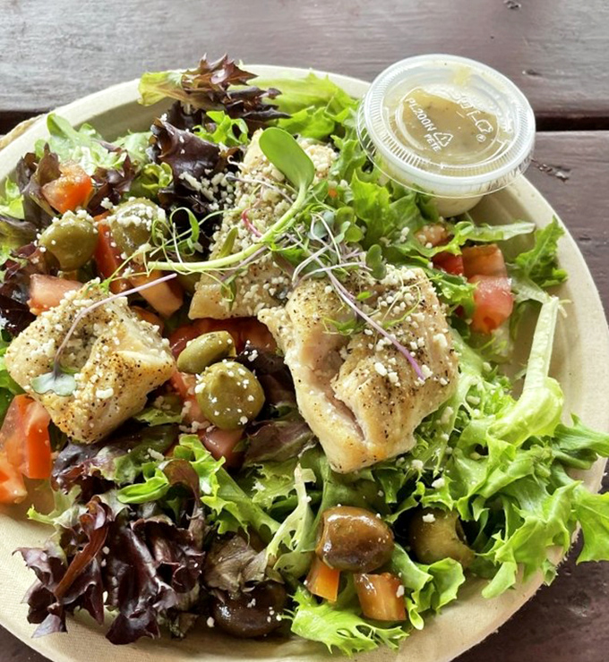 A salad that seafood skeptics dream about – fresh fish and greens dancing together in a celebration of healthier choices.