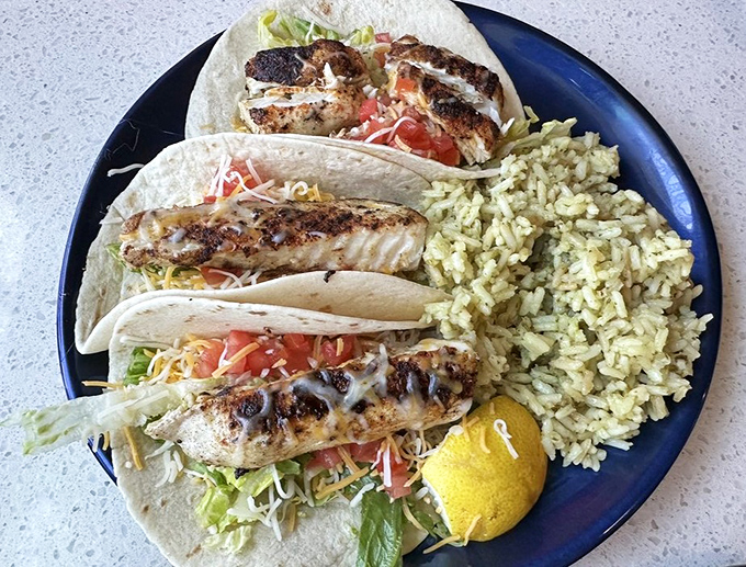 Fish tacos that make you wonder why you ever eat anything else. That side of rice is playing a delicious supporting role.