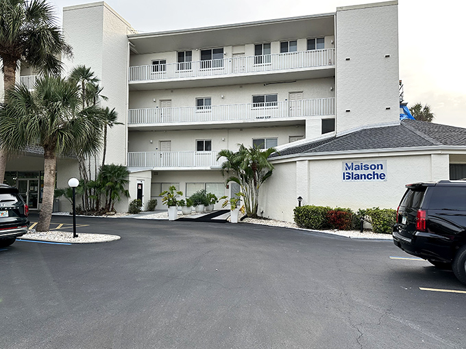 Understated elegance in white. Maison Blanche's clean lines and tropical landscaping epitomize Longboat Key's sophisticated yet relaxed aesthetic.