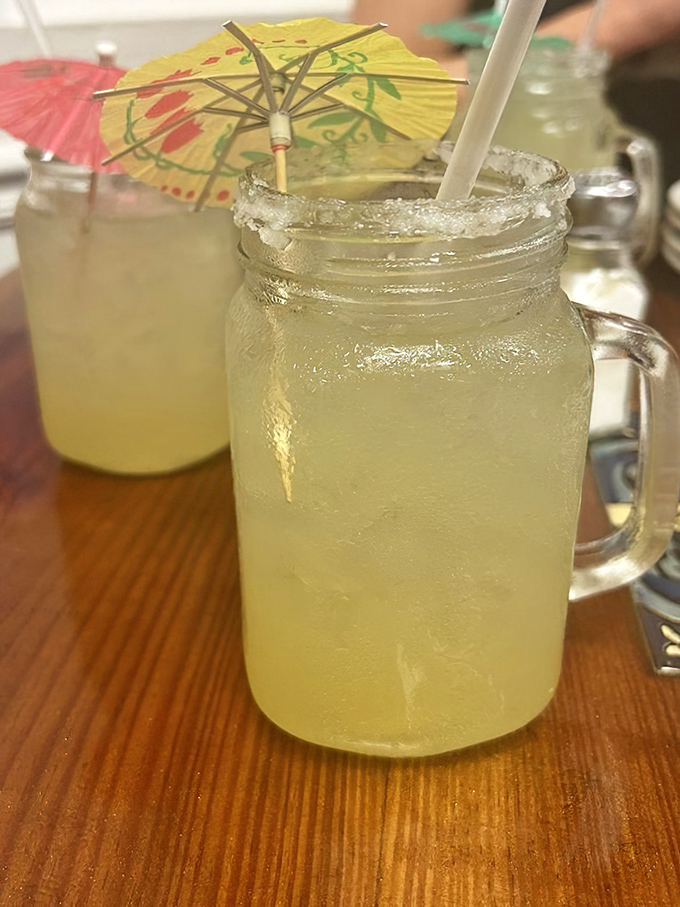Mason jar margaritas with tiny umbrellas don't just quench thirst&mdash;they're vacation in a glass, even if you're just on lunch break.