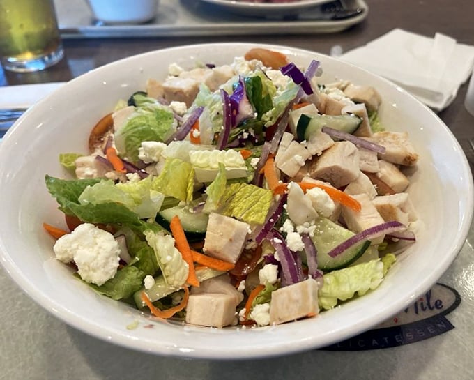 Fresh and vibrant Mediterranean salad provides a lighter option, though calling anything at Miracle Mile "light" feels like a charming contradiction.