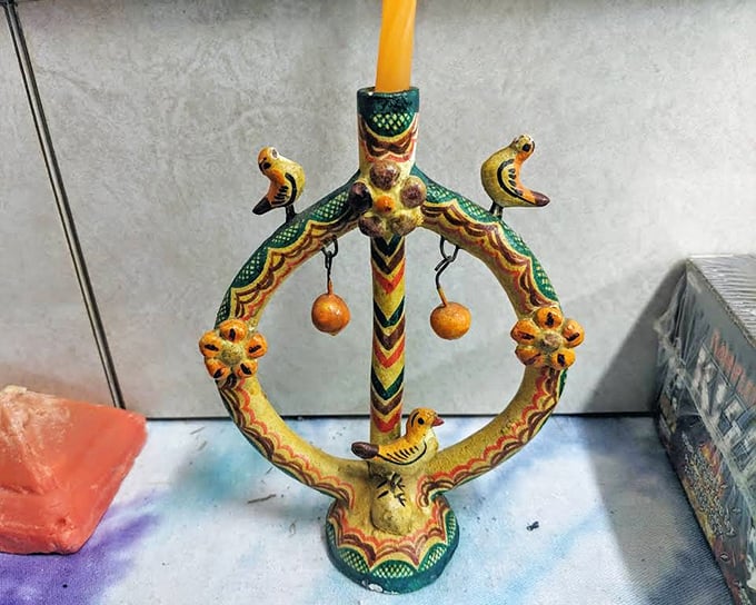 This Mexican Tree of Life candleholder isn't just decor—it's a vibrant piece of cultural artistry that brings warmth to any room.