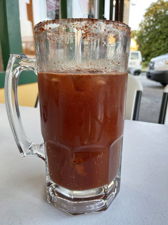 This isn't just a Michelada—it's a spicy, savory beer cocktail that arrives in a mug big enough to require a two-handed toast.