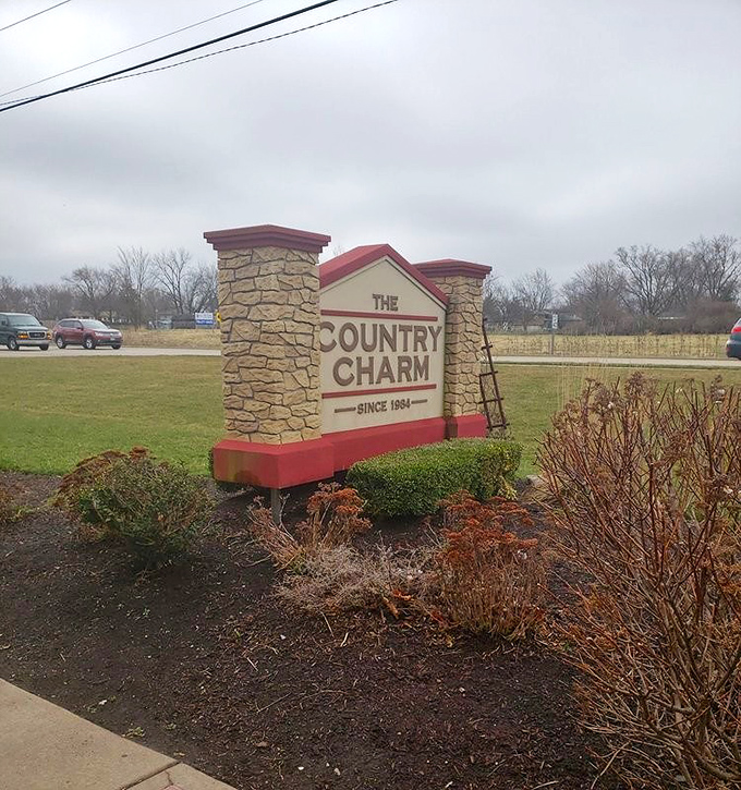 Even on a gray Illinois day, that Country Charm sign stands as a beacon of breakfast hope. Some landmarks guide ships; this one guides appetites.