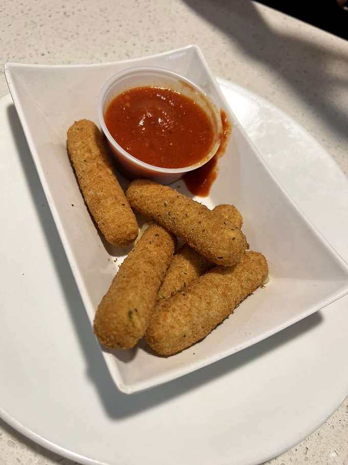 Mozzarella sticks&mdash;the diplomat of appetizers that everyone at the table can agree on. Crispy outside, stretchy inside, marinara mandatory.