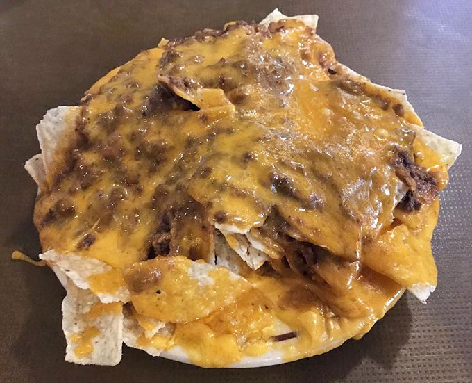 Nachos that require a strategy to eat&mdash;each chip a potential vehicle for maximum cheese-to-chili ratio perfection.