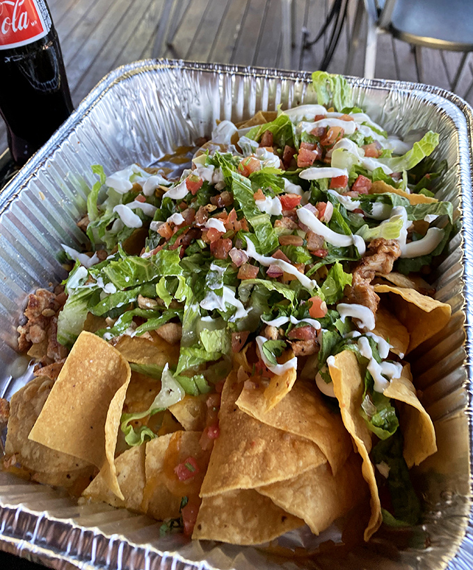 These nachos aren't playing around&mdash;they've invited every topping to the party and nobody's leaving until the plate is clean.