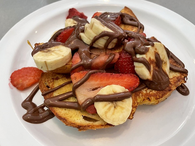 Nutella French toast with fruit isn't just breakfast—it's dessert that found a morning loophole in the rulebook of adulting.