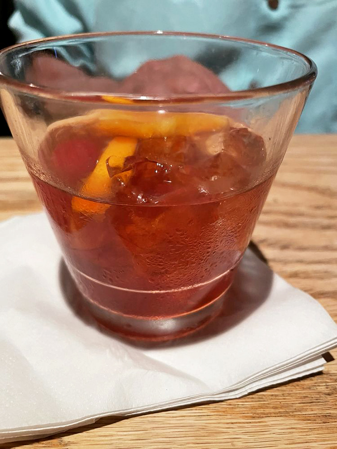 An Old Fashioned that Don Draper would approve of &ndash; amber liquid, aromatic bitters, and just enough sweetness to balance the bourbon.