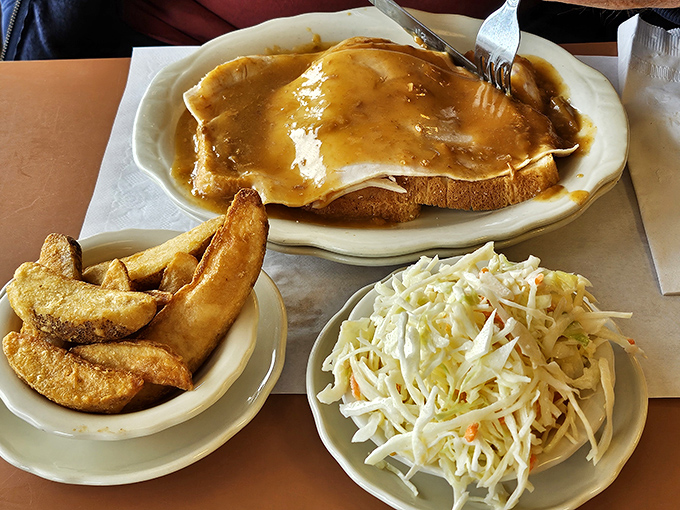 The open-face turkey sandwich &ndash; Thanksgiving on a plate, any day of the year. The gravy alone deserves its own fan club.