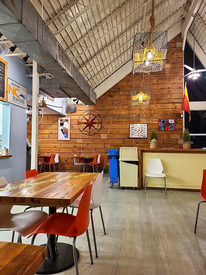 Warm wood paneling creates the feeling of dining in a particularly delicious ship's cabin. Maritime charm meets culinary excellence.