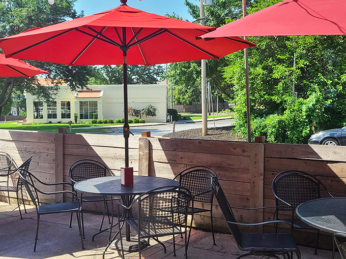 Outdoor seating that beckons on sunny Kansas days. Red umbrellas provide shade while you contemplate ordering seconds&mdash;or thirds. No judgment here.