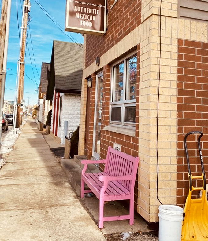 That pink bench isn't just seating &ndash; it's the most cheerful sentinel on South Park Street, standing guard outside flavor paradise.