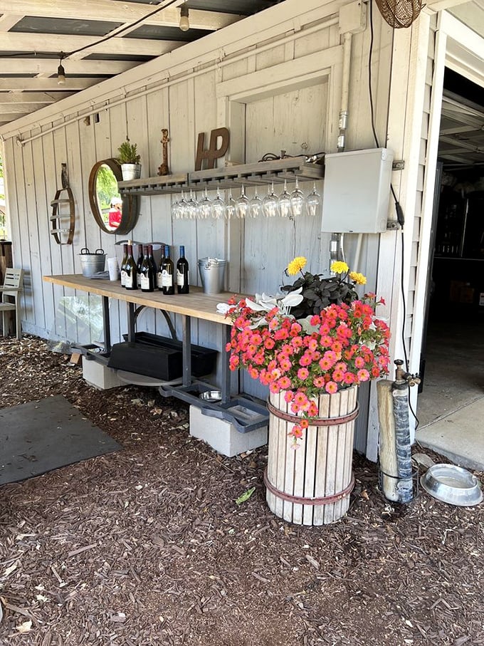 This outdoor wine bar proves that sometimes the best restaurants come with fresh air and flowers instead of fancy chandeliers.