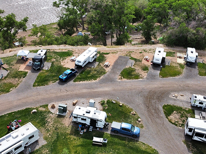 Riverside camping at Palisade Basecamp offers RV enthusiasts front-row seats to Colorado's natural splendor without sacrificing modern comforts.