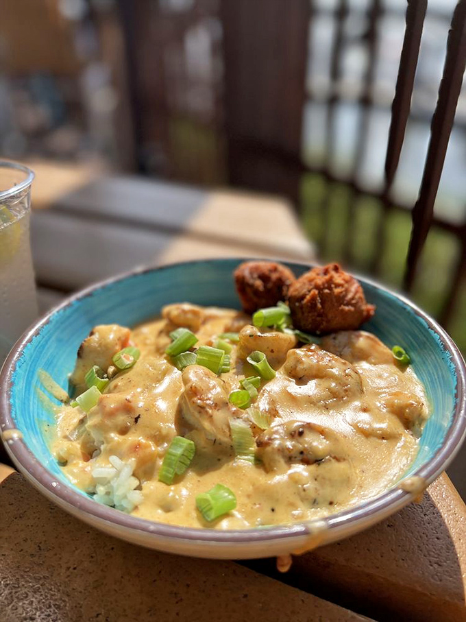Creamy, dreamy shrimp and rice that puts ordinary comfort food to shame. Those hush puppies on the side aren't optional – they're essential.