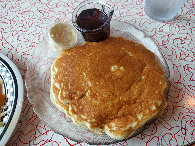 A pancake so perfectly golden it deserves its own spotlight&mdash;the supporting actors of butter and syrup wait patiently in the wings.