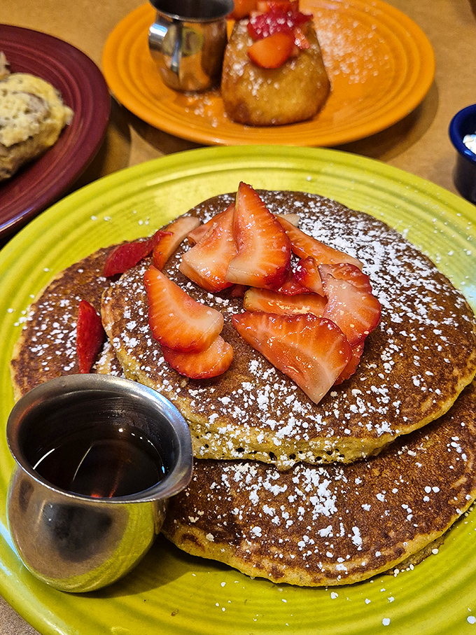 Pancakes that deserve their own Instagram account, topped with strawberries that didn't sacrifice their lives in vain.