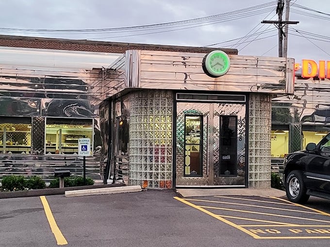 Even the parking lot maintains the classic chrome aesthetic. That green clock reminds you it's always time for breakfast at Diner on 55th.