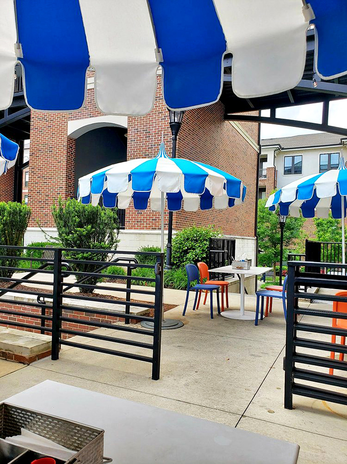 The patio offers al fresco dining with a side of people-watching. Those distinctive blue and white umbrellas provide shade while you savor your seafood.