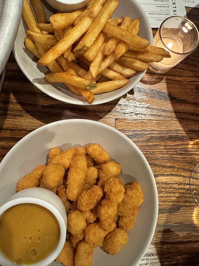 Popcorn shrimp that pops with flavor, not grease. Paired with fries that achieve the golden crispness of childhood memories.