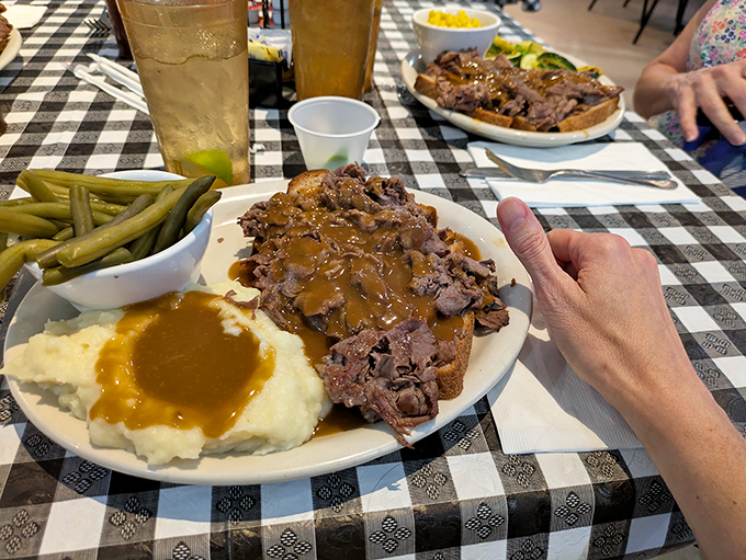 Pot roast that doesn't need a 24-hour sous vide treatment—just slow-cooked tenderness that falls apart at the mere suggestion of a fork.