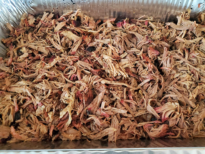Pulled pork in its natural habitat: piled high and ready for sandwich duty. This is what carnivore dreams are made of.