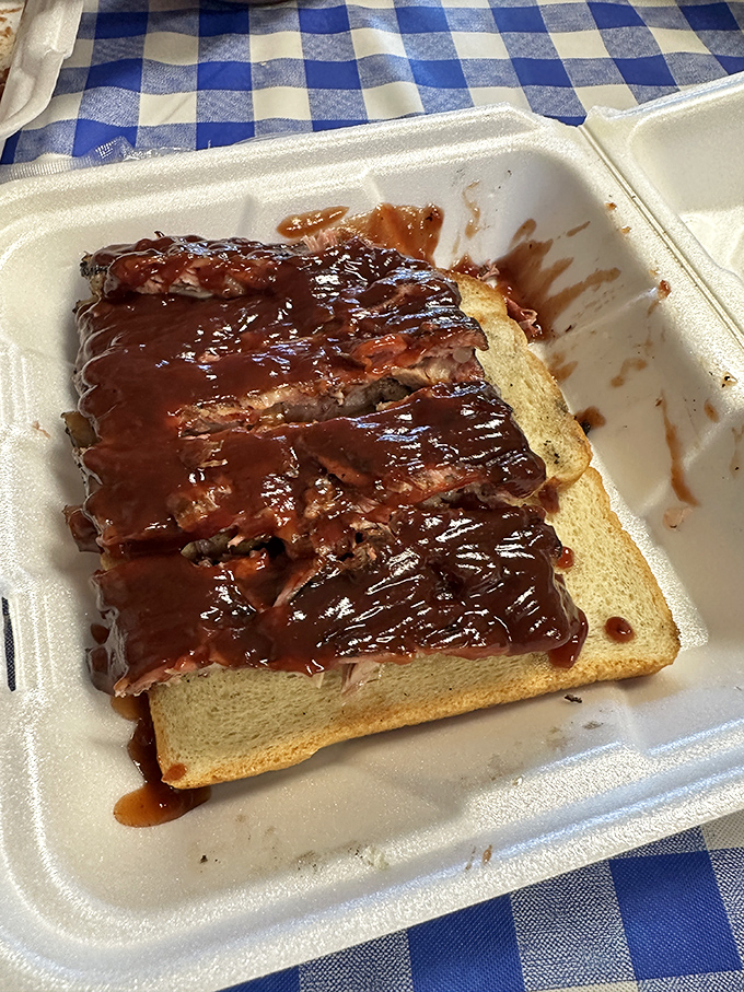 The rib sandwich on white bread is barbecue in its most honest form. No fancy buns needed when the meat is this good&mdash;just a vehicle for getting ribs to your mouth.