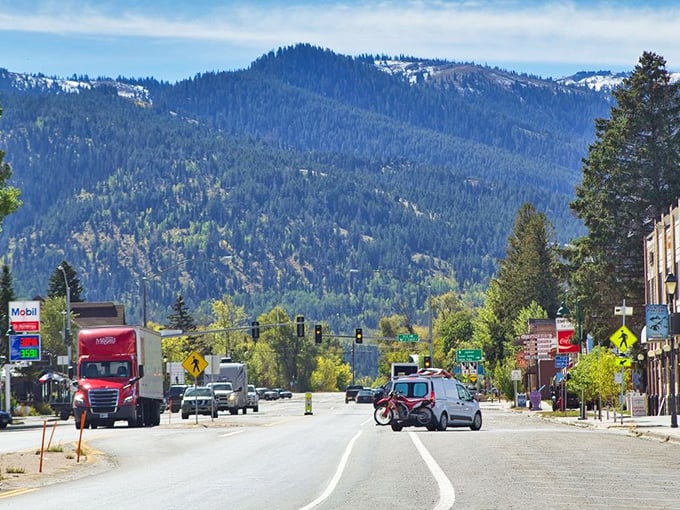The road into town offers that perfect moment when civilization and wilderness meet, with mountains standing guard over Driggs' welcoming main drag.