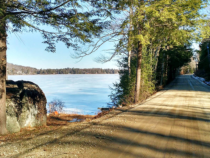 Winter's grip transforms Harrisville's country roads into passages through a frozen wonderland where silence speaks volumes about rural beauty.