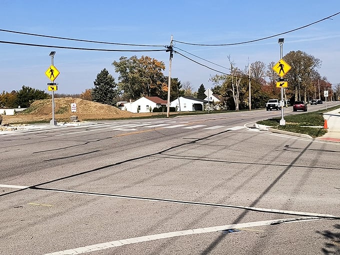 Crosswalks and pedestrian signs&mdash;small but significant indicators that this town was designed for humans, not just vehicles rushing through.