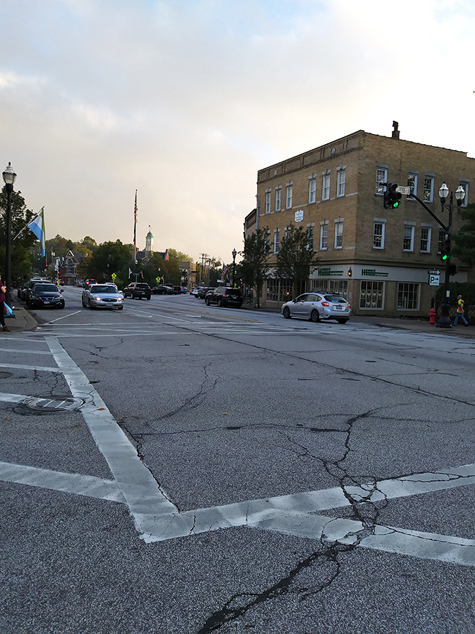 Sunset bathes the streets in golden light, transforming ordinary intersections into moments where you realize small towns still have big magic.