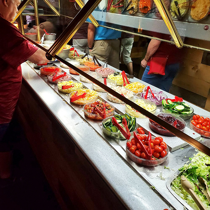 The salad bar offers a rainbow of fresh ingredients, proving that "eating your vegetables" doesn't have to be the chore your mother made it out to be.