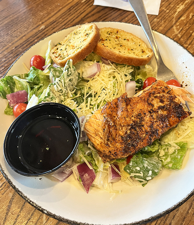Salmon that swam upstream and landed on the perfect salad. Flaky fish meets crisp greens in a healthy option that doesn't sacrifice flavor.