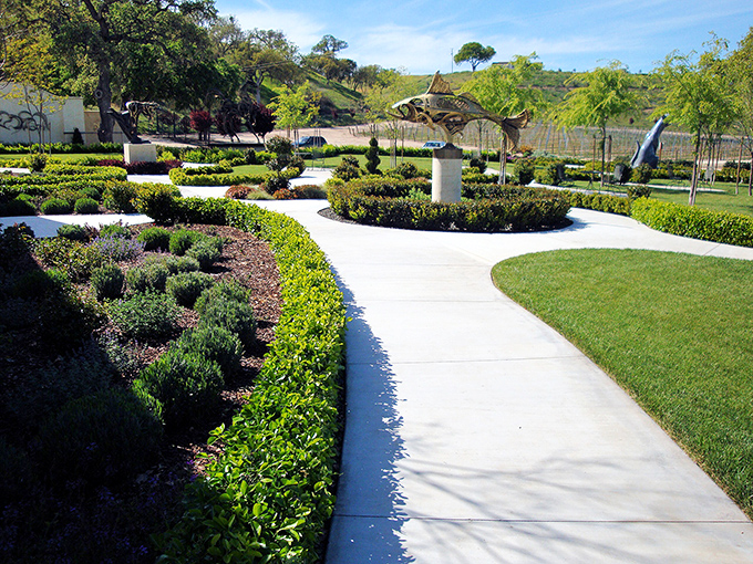 Sculpterra's garden paths wind through art and agriculture. Where else can you contemplate bronze sculptures while sipping award-winning Cabernet?