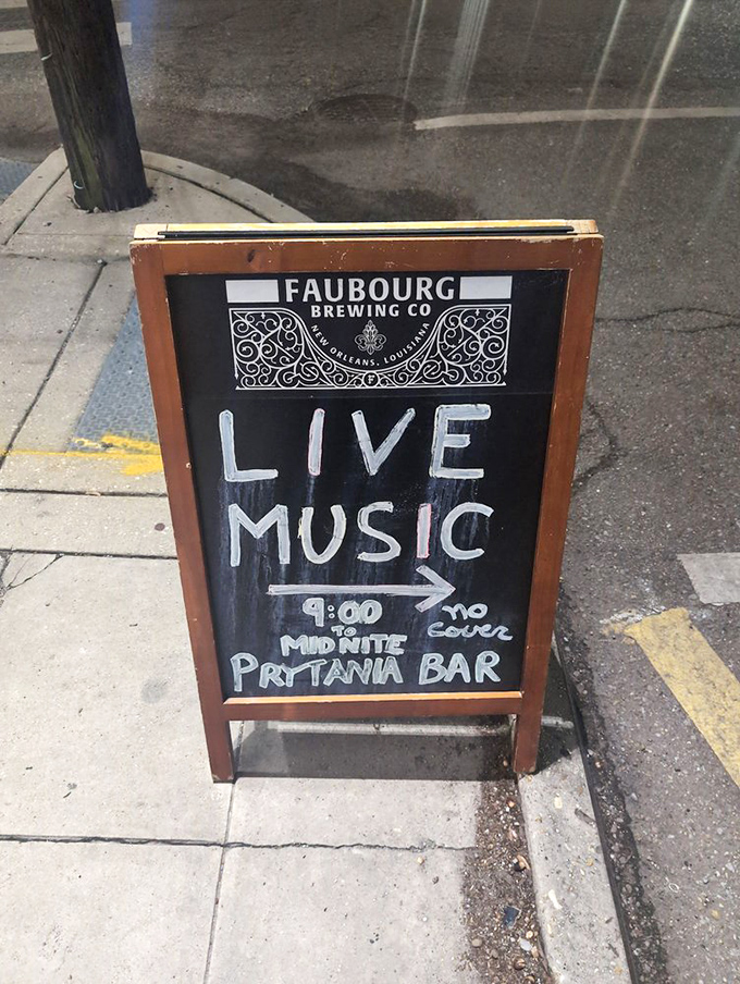 "Live Music 9:00 to Midnite"&mdash;six words that promise an evening of New Orleans magic. This sidewalk sign isn't just information; it's an invitation to joy.