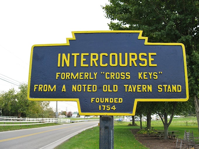 The town sign reveals Intercourse's innocent etymology&mdash;a crossroads of commerce rather than the punchline many visitors initially expect.