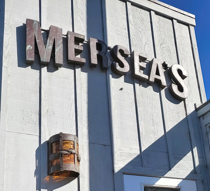 The Mersea's sign stands proud against weathered white boards&mdash;a beacon for hungry travelers like a lighthouse for the gastronomically adrift.
